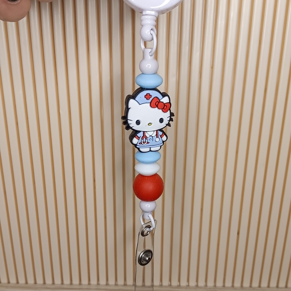 Hello Kitty | Accessories | Hello Kitty Badge Reel Red And Light Blue ...